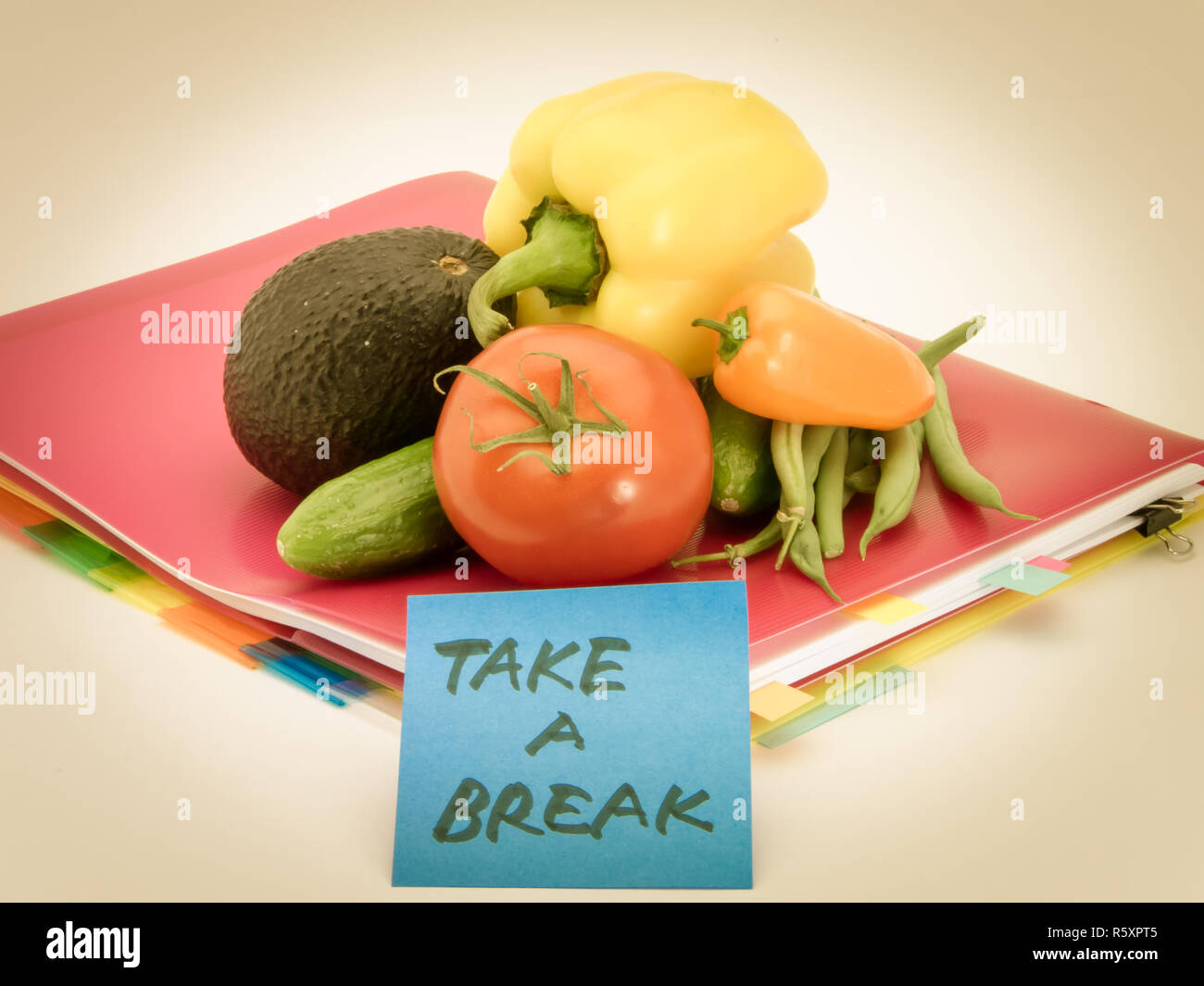 Office Documents and Vegetables Take a Break Stock Photo - Alamy