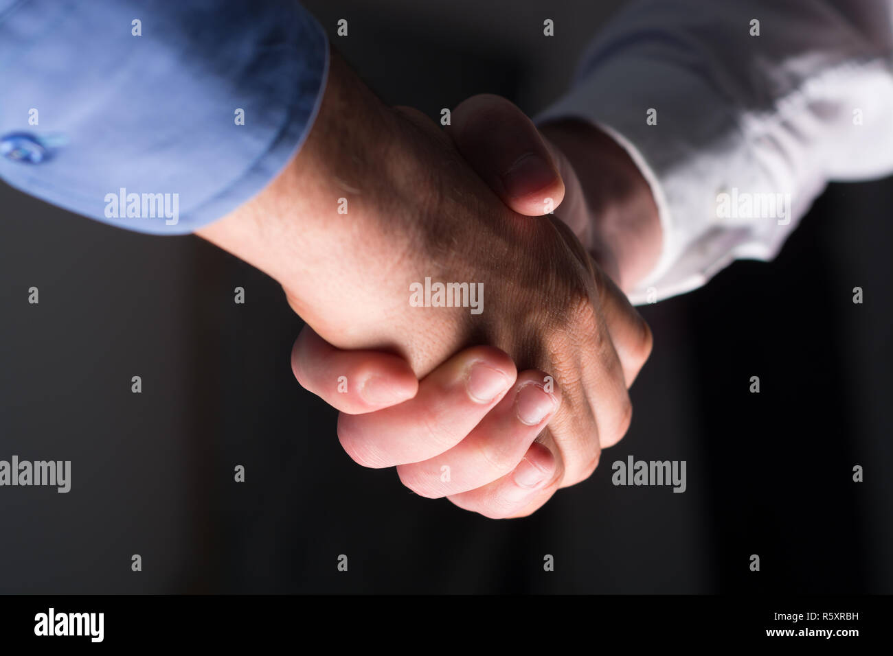 Businessmen handshaking greeting gesture project hi-res stock ...