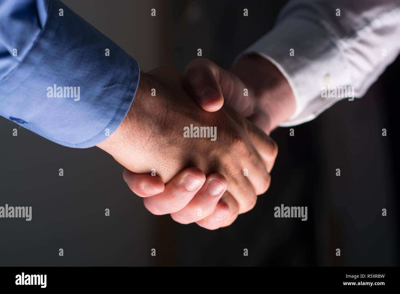 Businessmen handshaking greeting gesture project hi-res stock ...