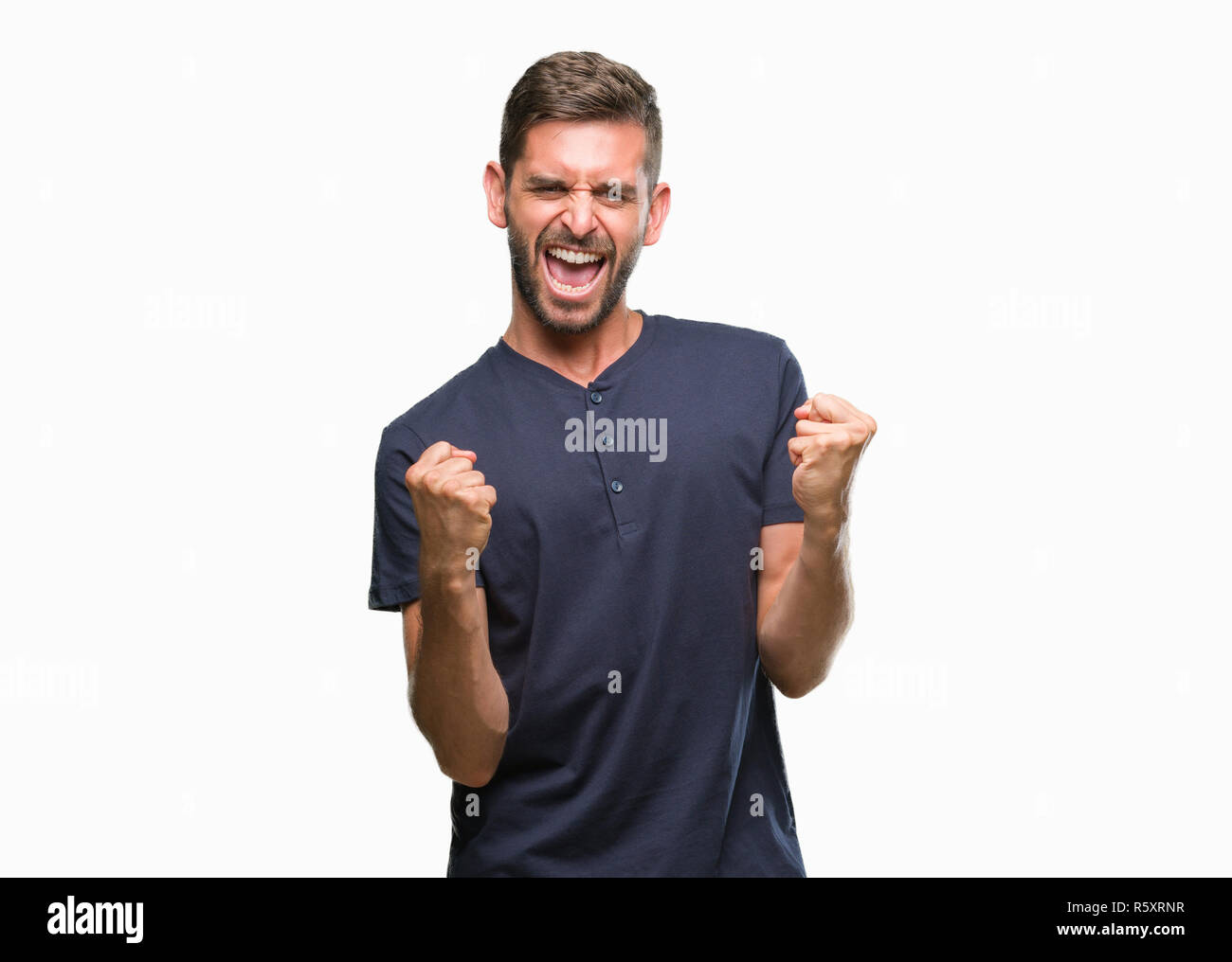 Young handsome man over isolated background very happy and excited ...
