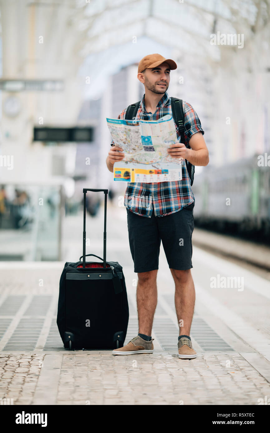 Man holding map hi-res stock photography and images - Alamy