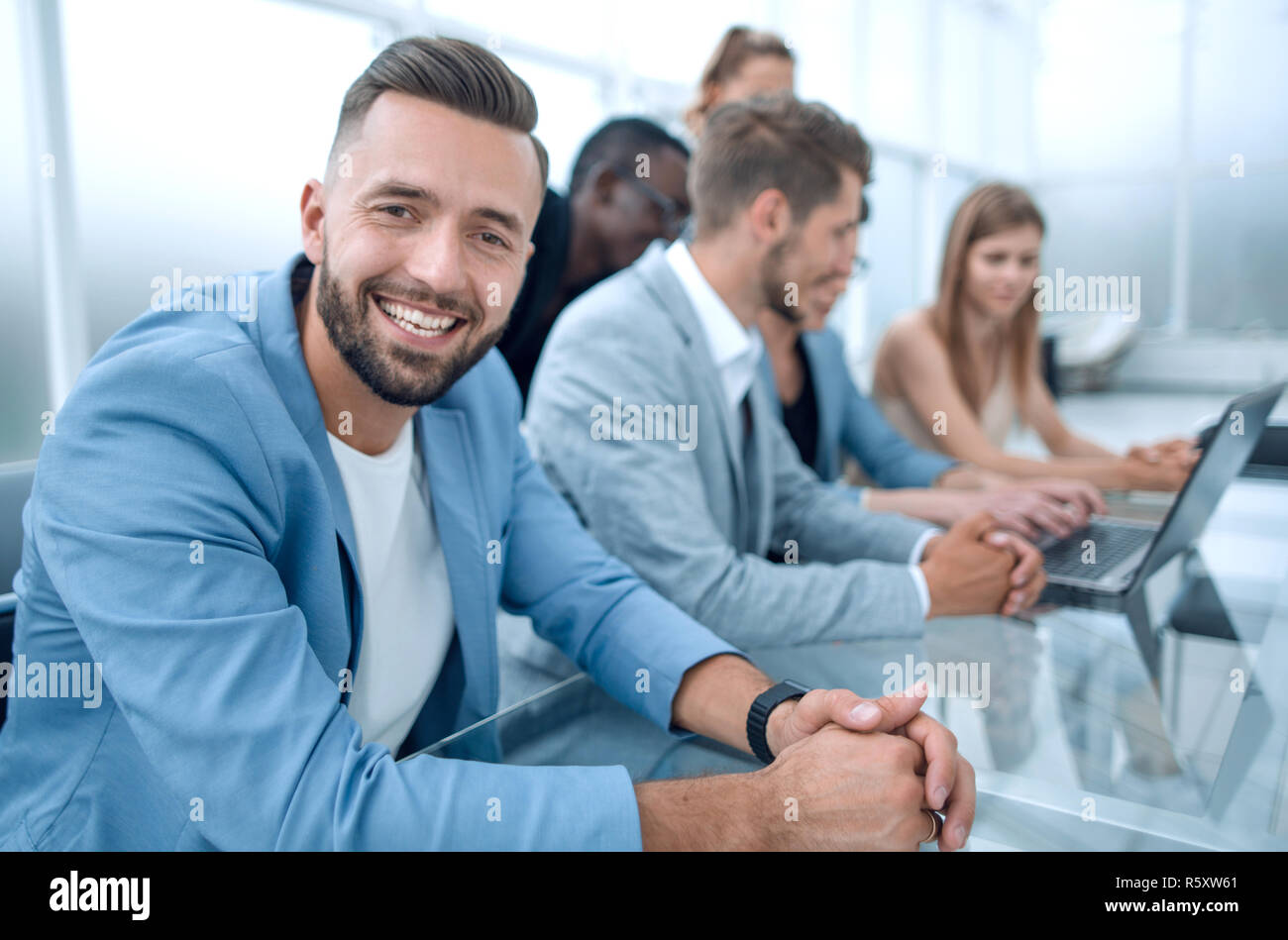 creative designers indoors at the table Stock Photo - Alamy