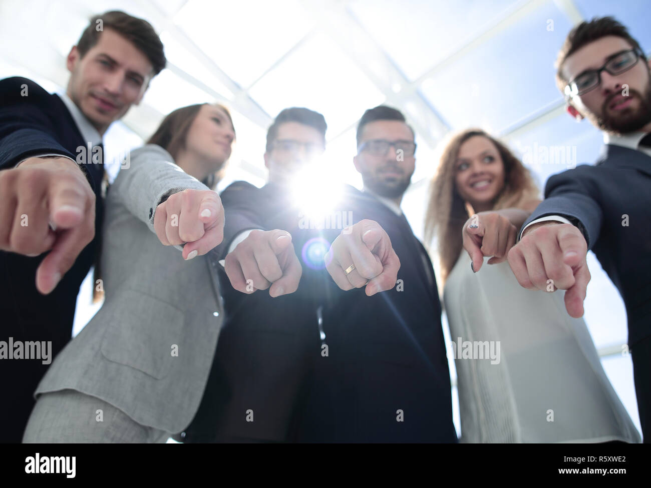 close up.successful business team pointing at you Stock Photo - Alamy