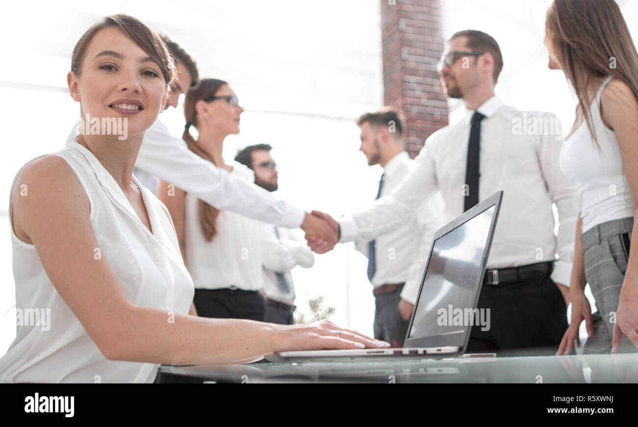 Manager shaking the hand of the employee in the office Stock Photo - Alamy