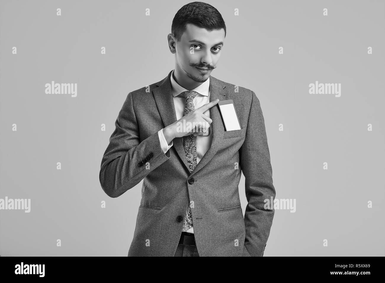 Portrait of handsome young confident arabic businessman with fancy ...