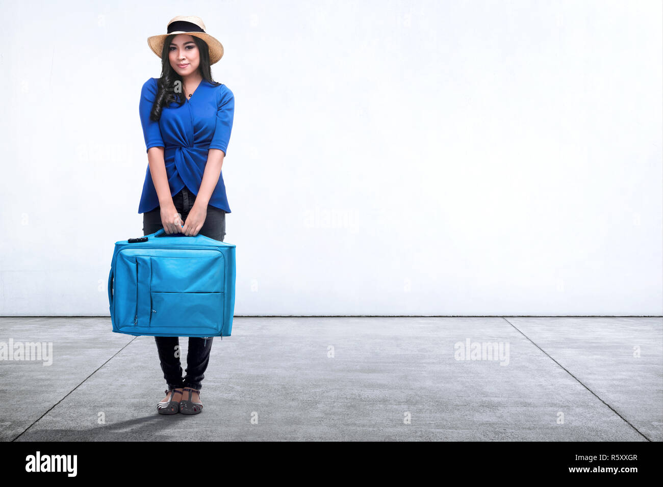 Girls Posing Suitcases High Resolution Stock Photography and Images - Alamy