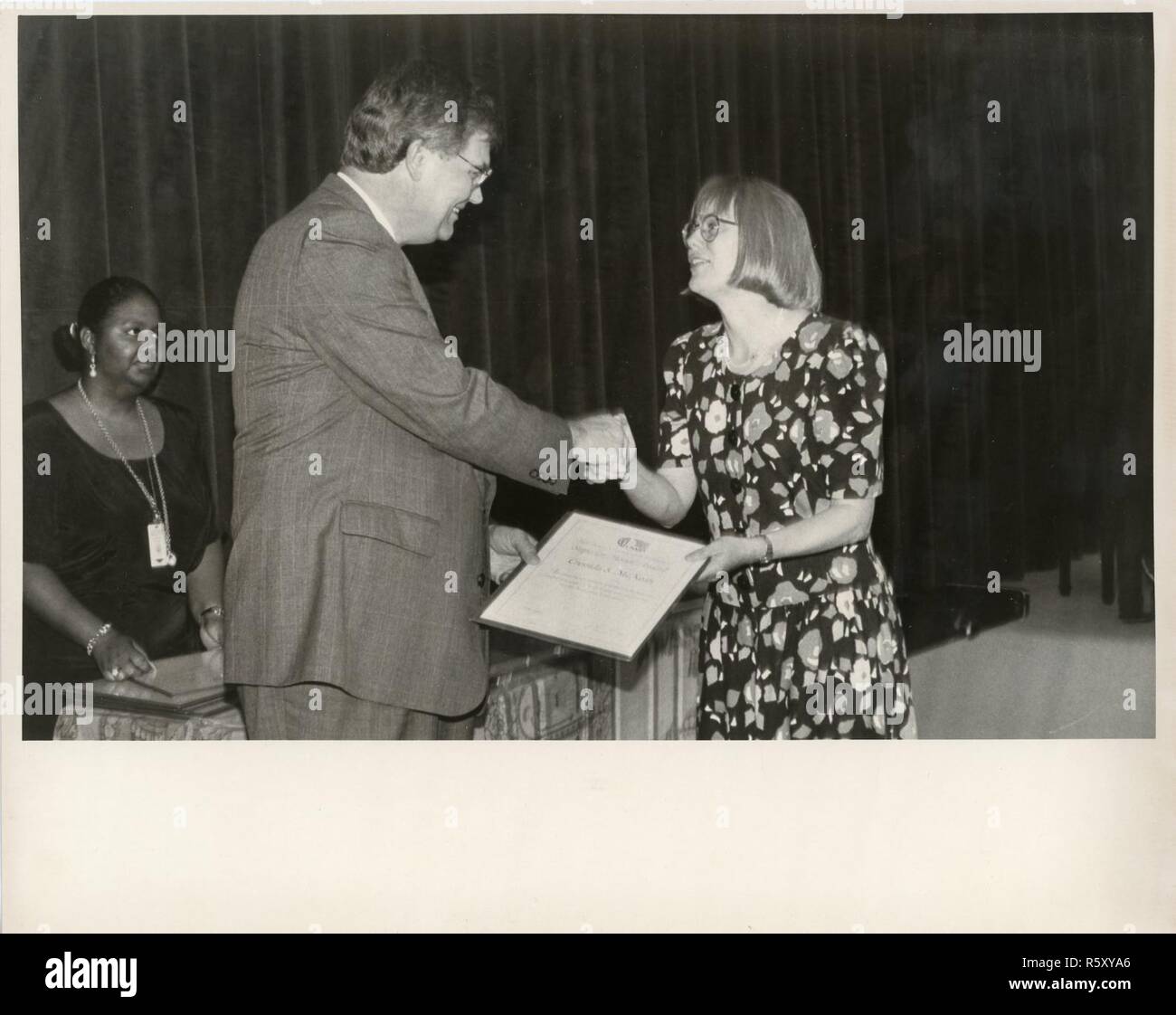 Admin. Atwood presenting general awards - Woman receiving award on ...