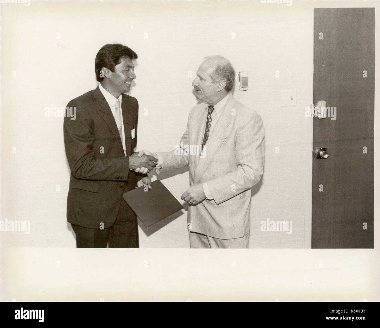 Admin. Atwood presenting general awards - Man receiving award Stock ...