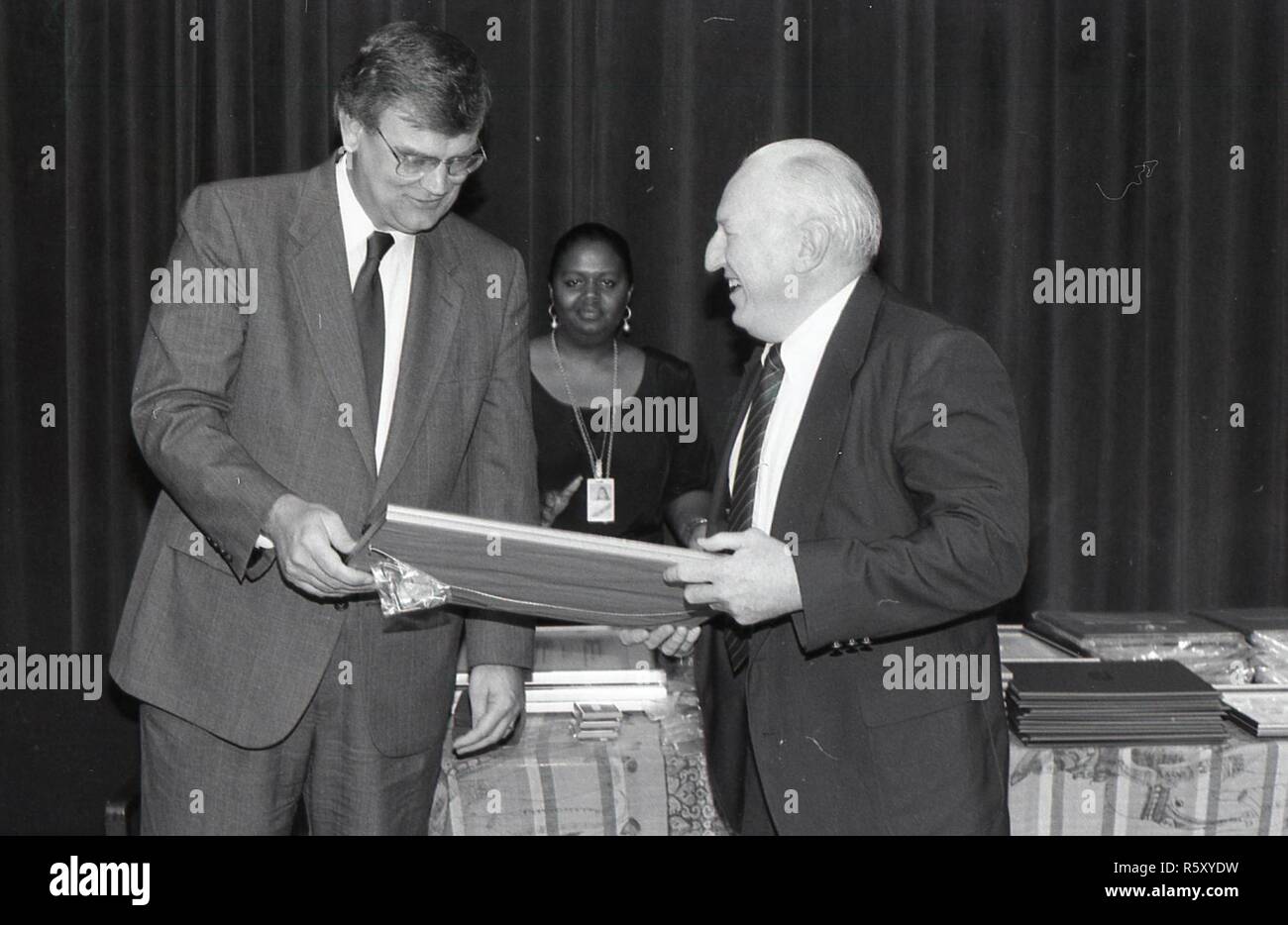 Admin. Atwood presenting general awards - Man receiving award on stage ...