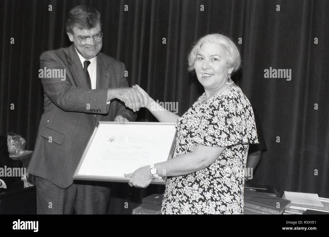 Admin. Atwood presenting general awards - Woman receiving award Stock ...