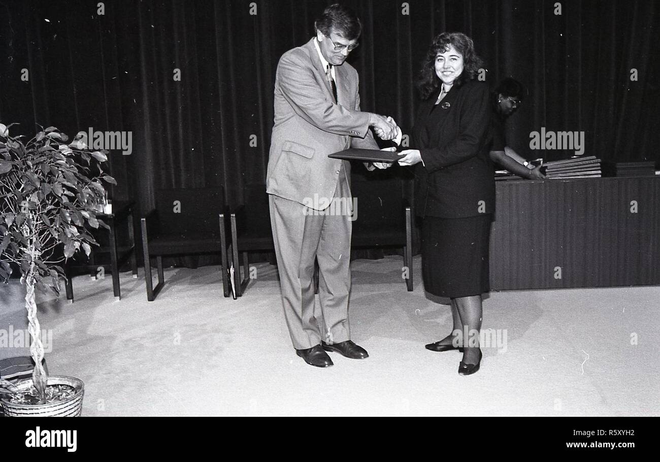 Admin. Atwood presenting general awards - Woman receiving award on ...