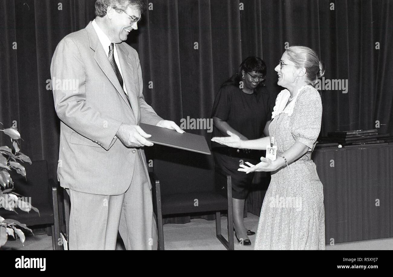 Admin. Atwood presenting general awards - Woman receiving award on ...