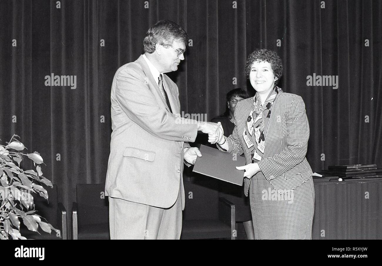 Admin. Atwood presenting general awards - Woman receiving award on ...