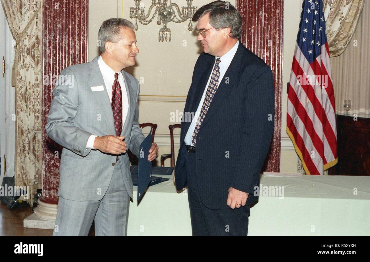 man accepting award taking a picture Stock Photo - Alamy