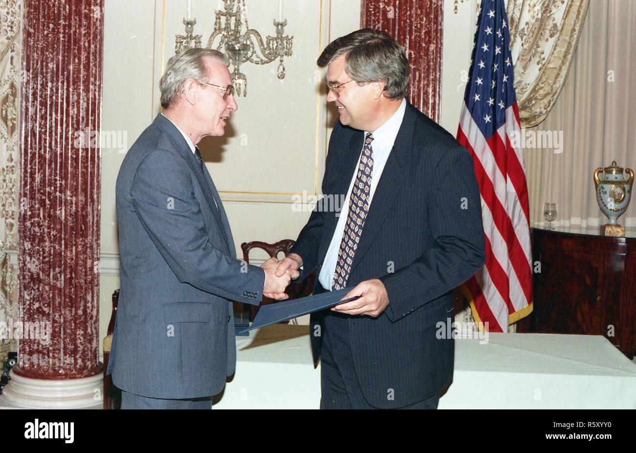 man accepting award taking a picture Stock Photo - Alamy
