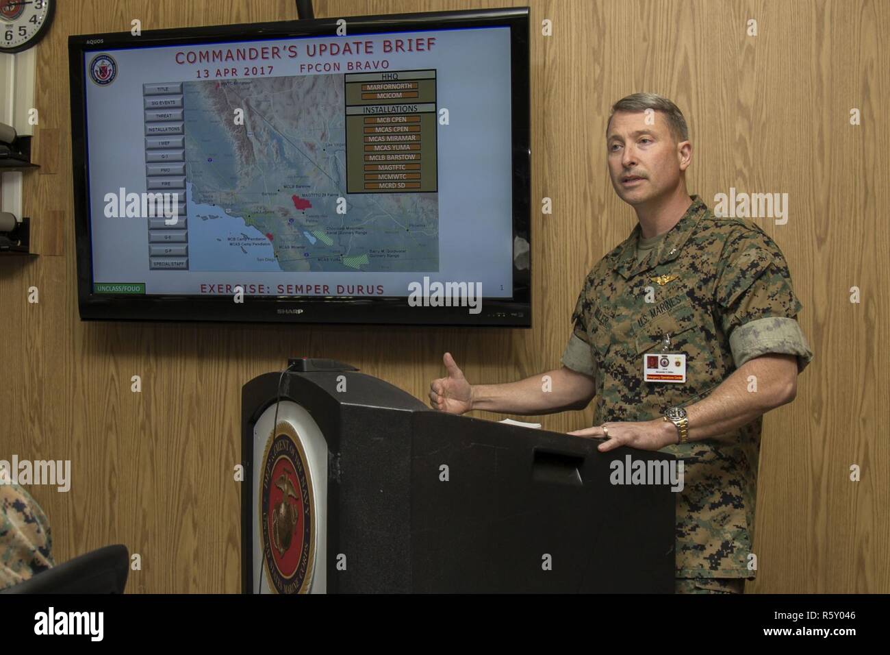 U.S. Marine Corps Lt. Col. Alexander H. Miller, senior watch officer ...