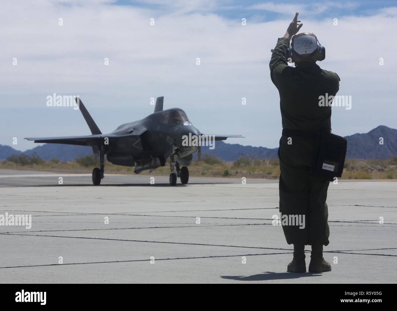 A U.S. Marine team leader with Marine Fighter Attack Squadron (VMFA ...