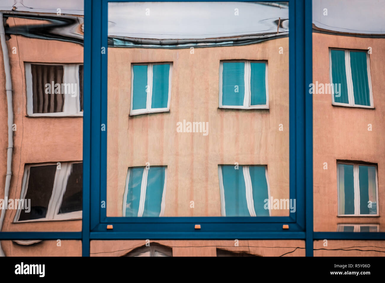 Distorted apartment window reflection Stock Photo - Alamy
