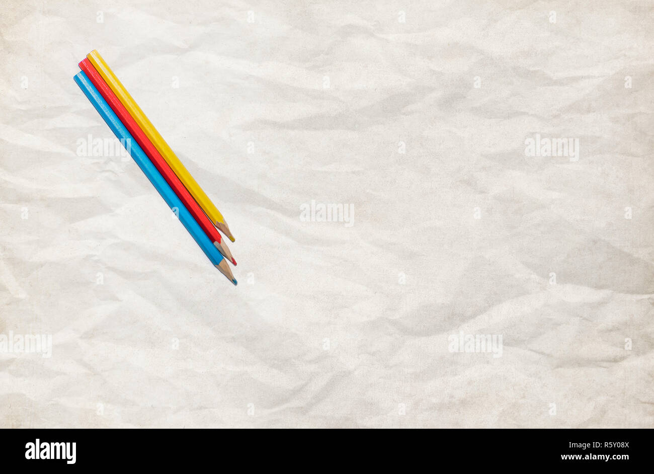 Colorful crayons on white paper Stock Photo - Alamy