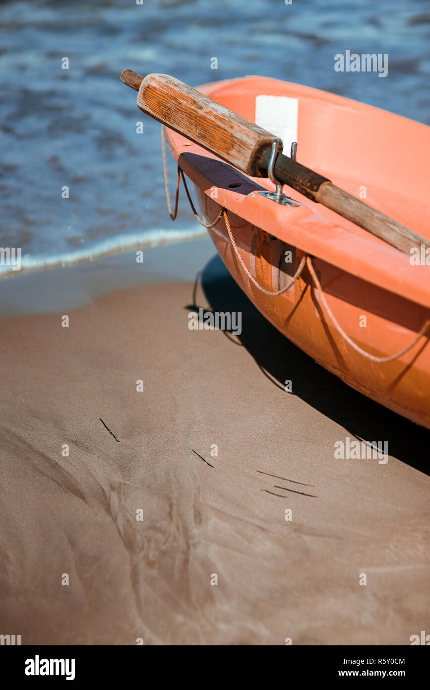 Orange lifeguard rescue boat Stock Photo - Alamy