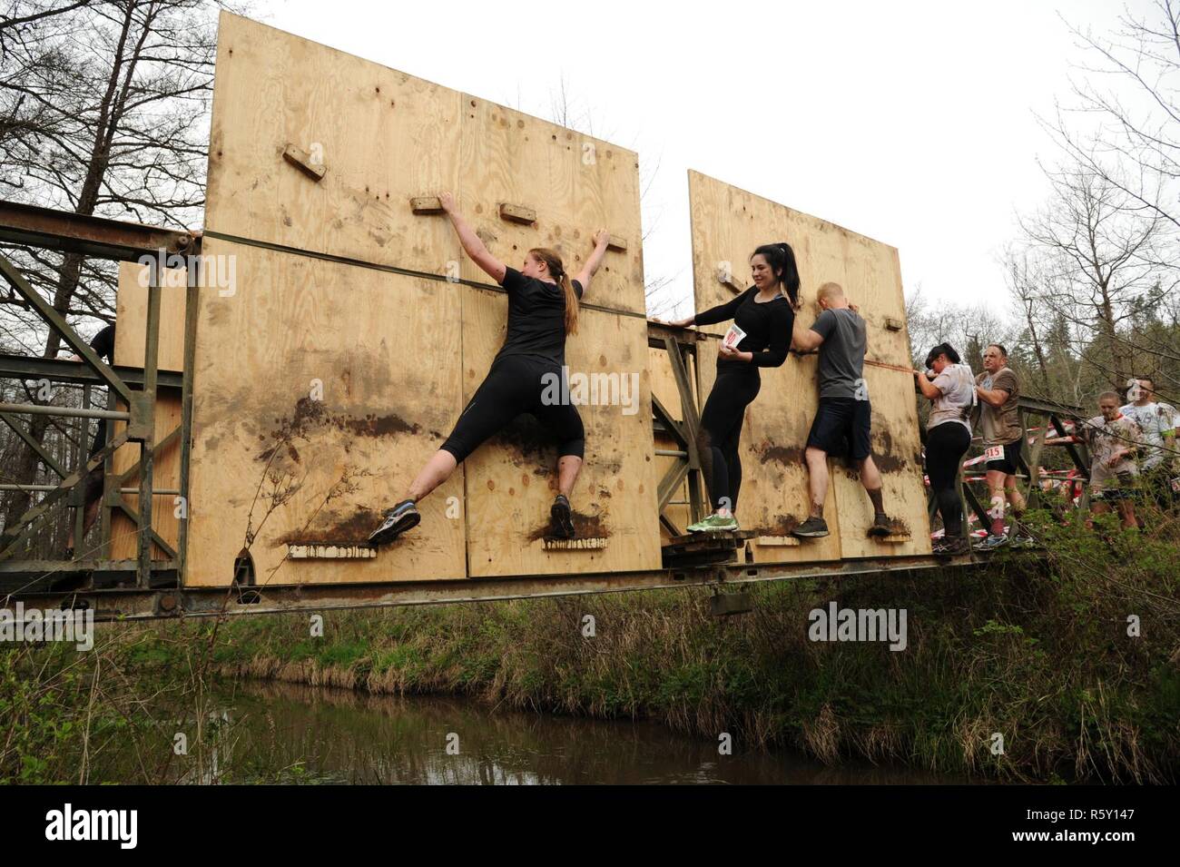 Runners participate in the annual Rugged Terrain Obstacle Run at ...