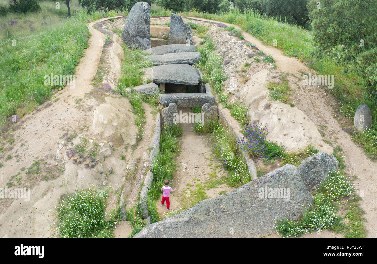 Little boy visitor discovering Dolmen of Lacara, Ancient megalithic ...