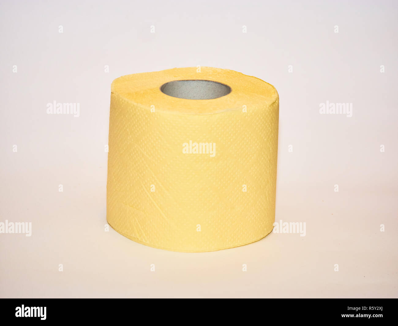 toilet paper, tissue yellow paper roll isolated on white background ...