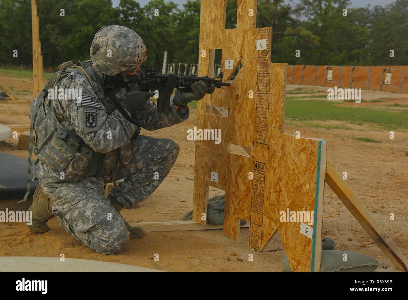 An 82nd Airborne Division first sergeant engages targets during the ...