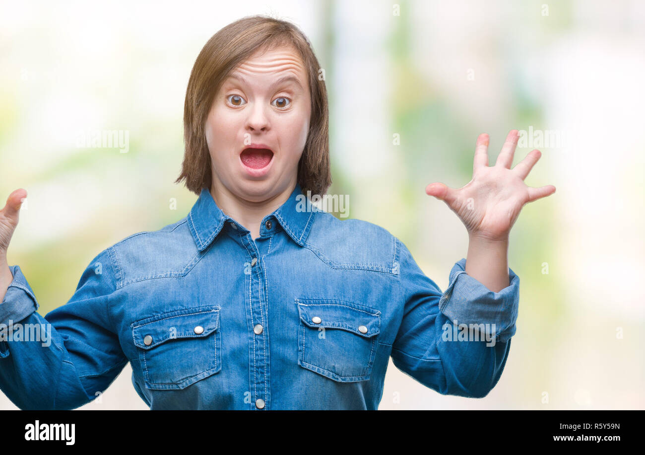 Young adult woman with down syndrome over isolated background ...