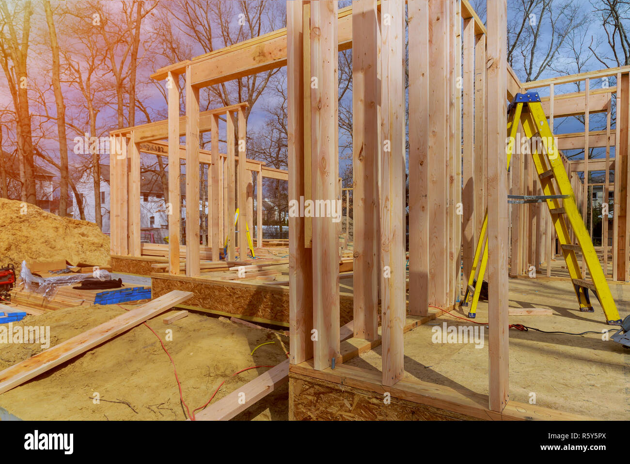 Wooden framing of a home, full frame new construction of a new house ...