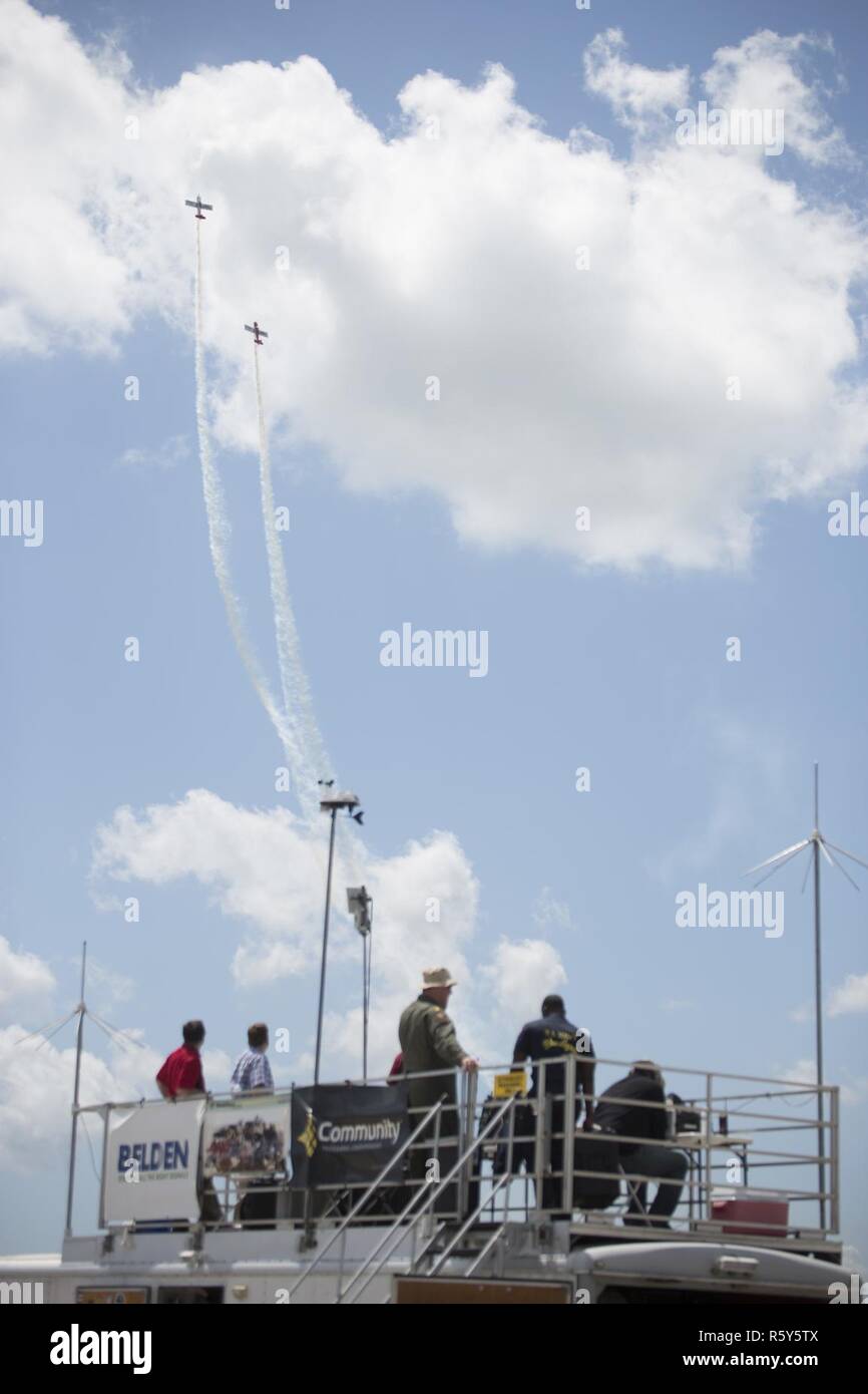 BELLE CHASSE, La. –Redline Airshows performs a double aerial acrobatics ...