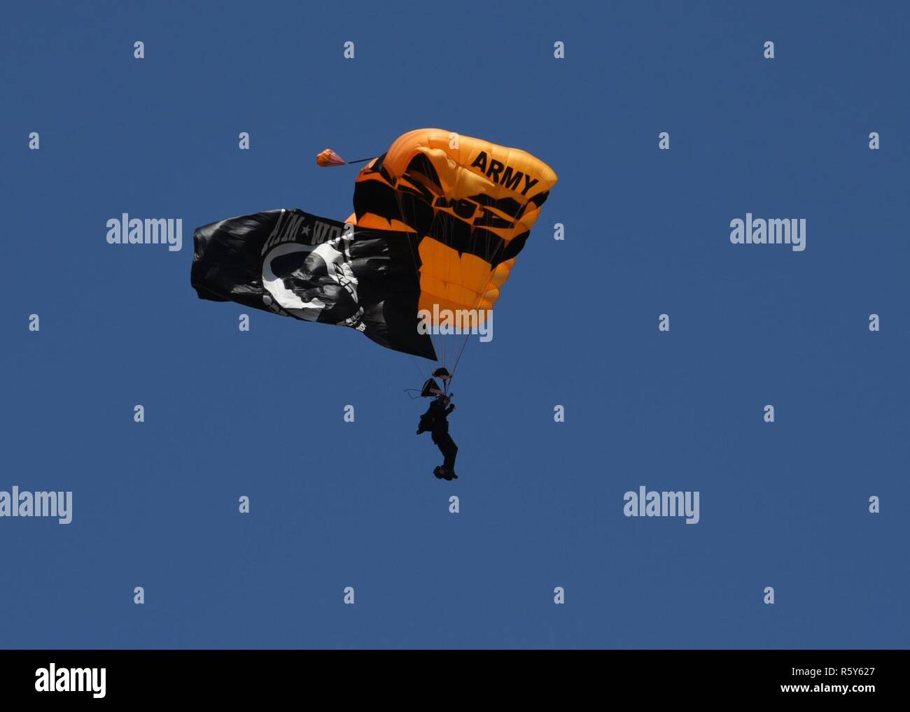 The U.S. Army Golden Knights team perform skydiving maneuvers during ...