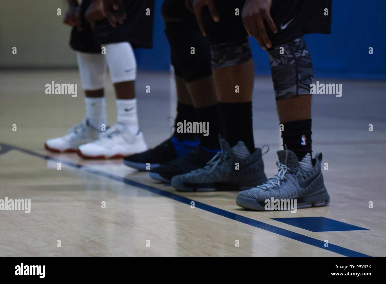 Members of the 2nd Security Forces Squadron basketball team and 2nd ...