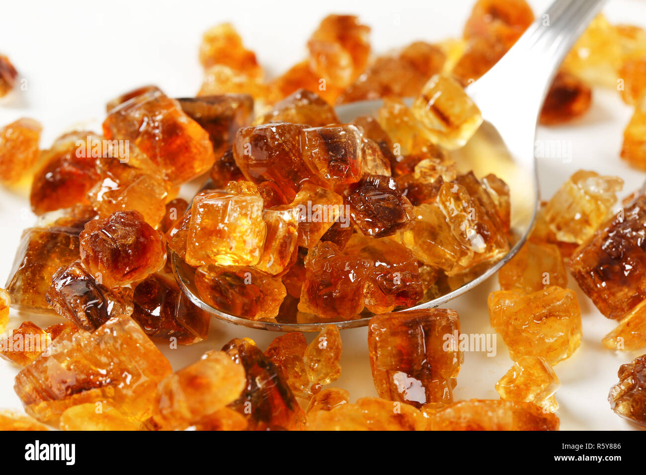 Brown rock sugar Stock Photo - Alamy
