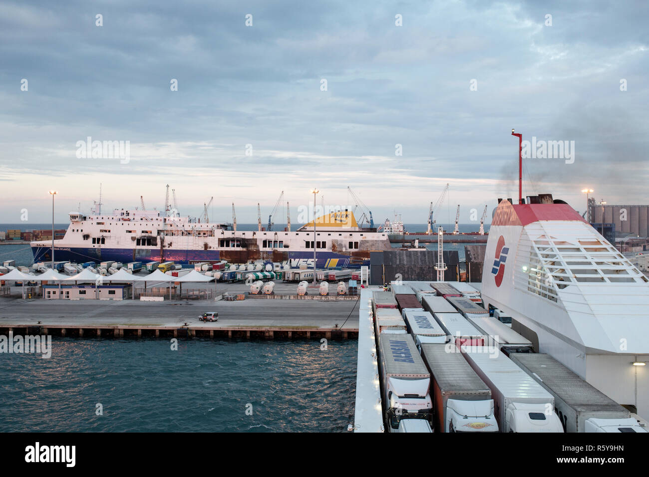 Departure from the port of Bari. In the background, anchored the Norman ...