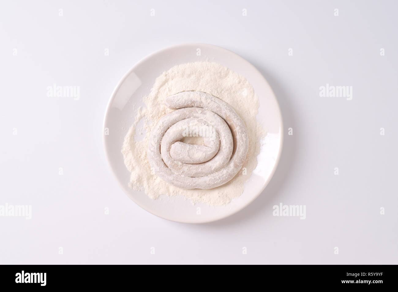 pork sausage in flour Stock Photo - Alamy