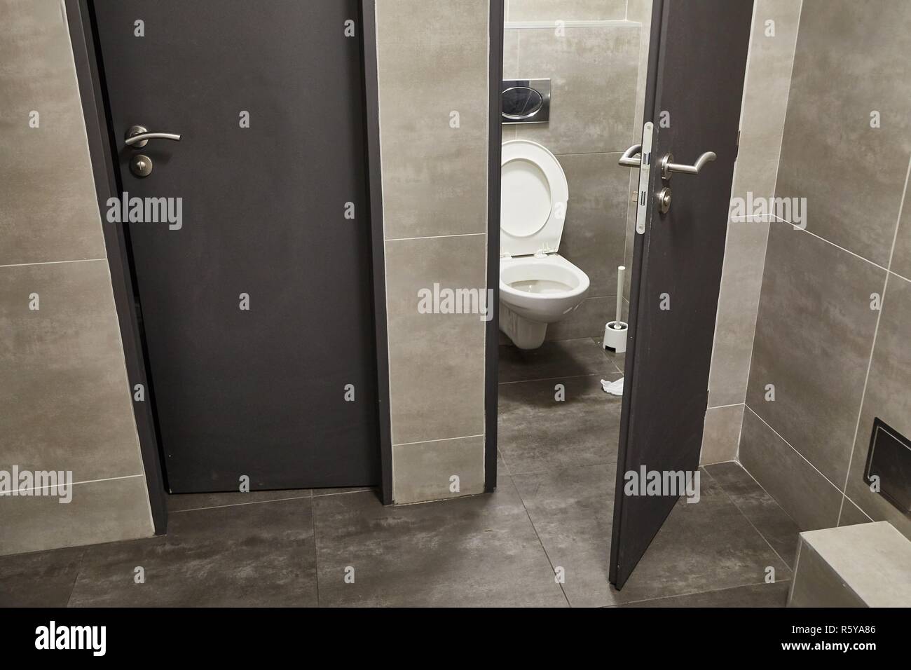 Toilet stall open Stock Photo - Alamy