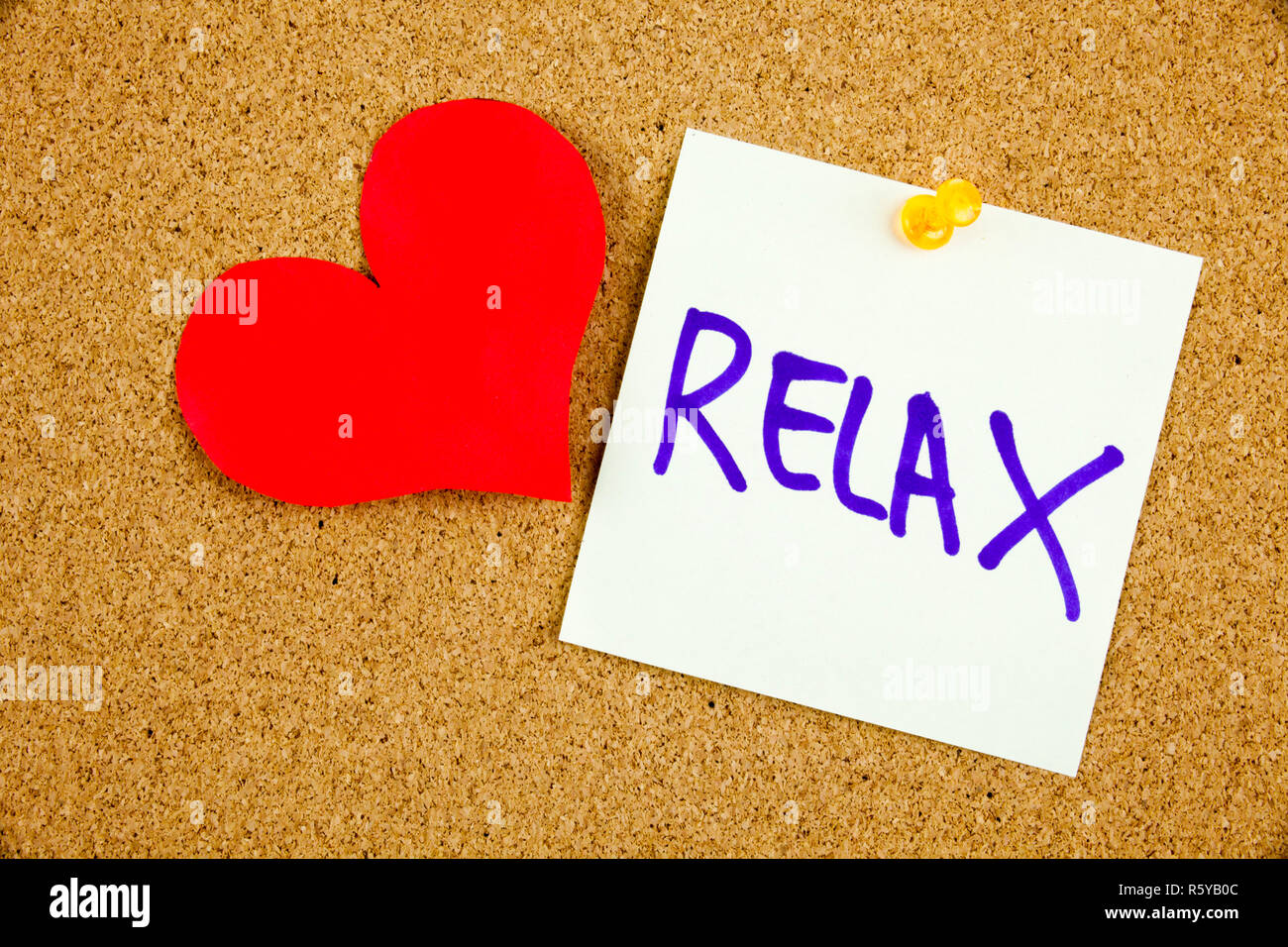 A yellow sticky note writing, caption, inscription Motivational concept ...