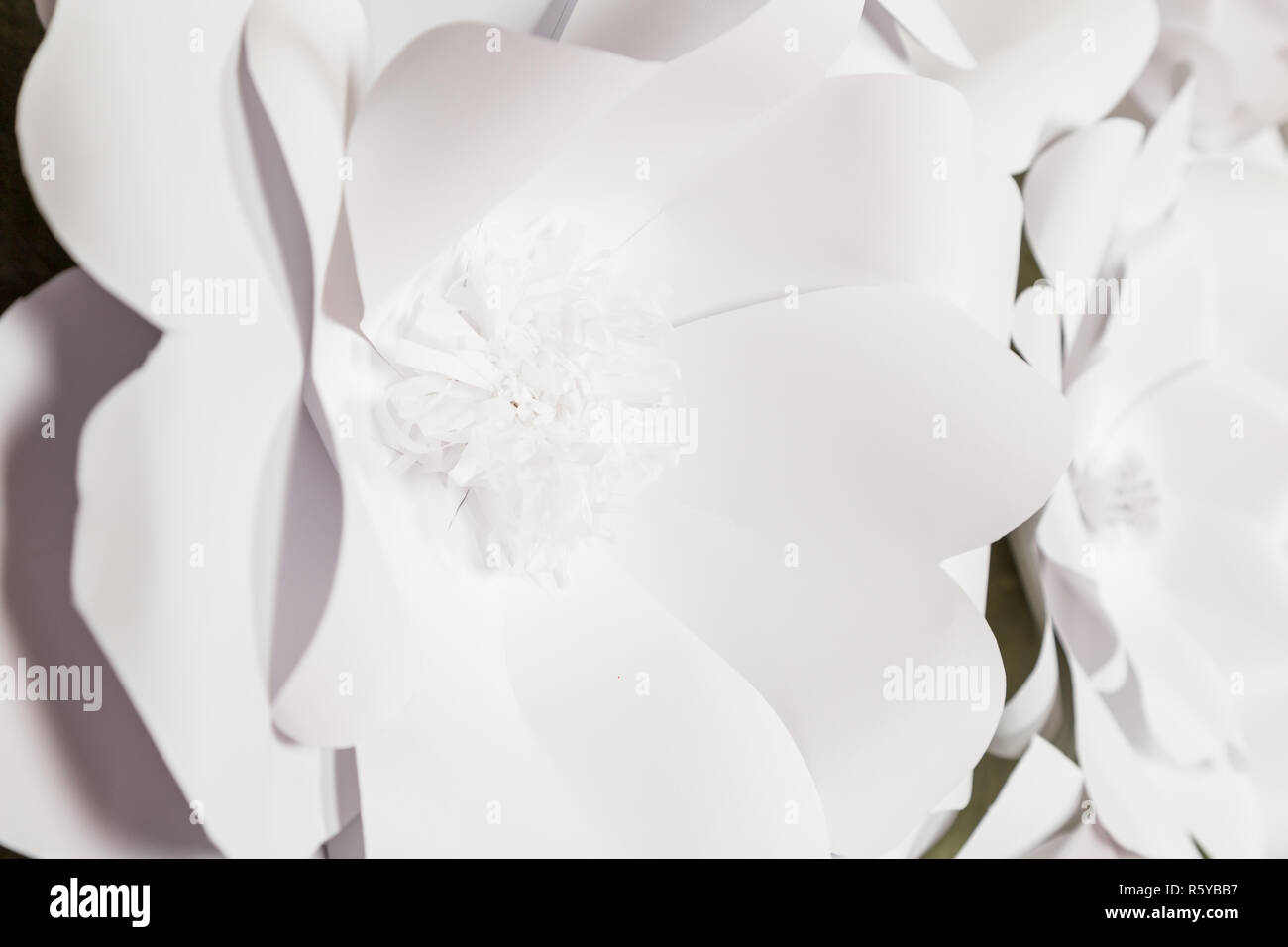 handmade paper flowers on interior Stock Photo - Alamy