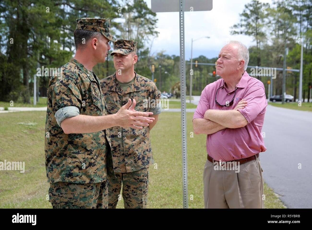 Lt. Col. Jeremy Winters, left, and Sgt. Maj. Marinica Ariton center ...