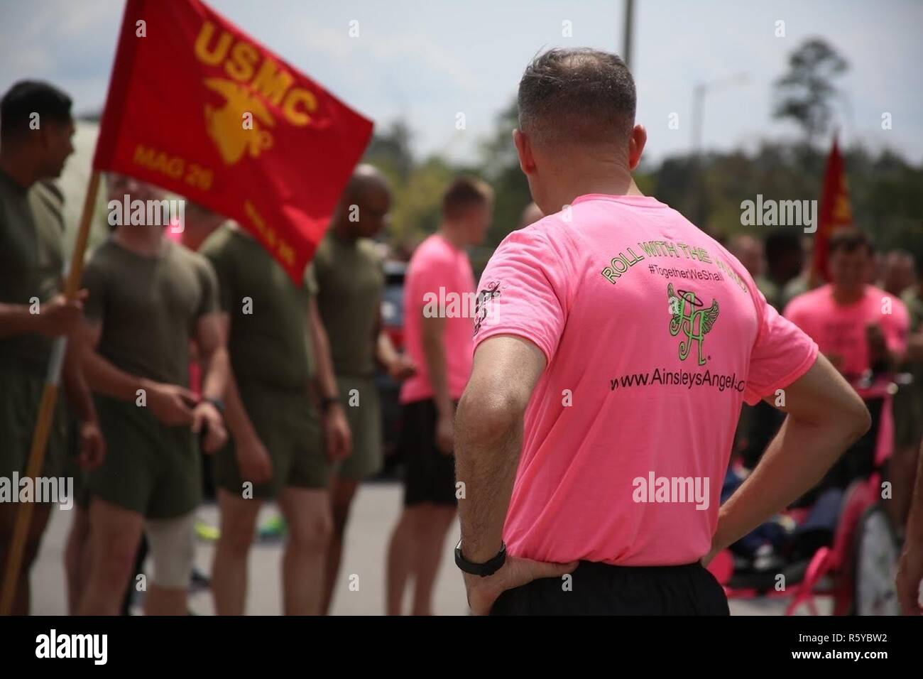 Lt. Col. Edward H. Carpenter looks over at a crowd of Marines during a ...