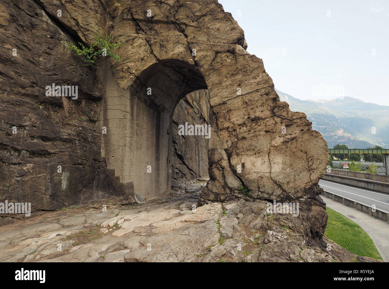 Ancient roman road arch in Donnas Stock Photo - Alamy