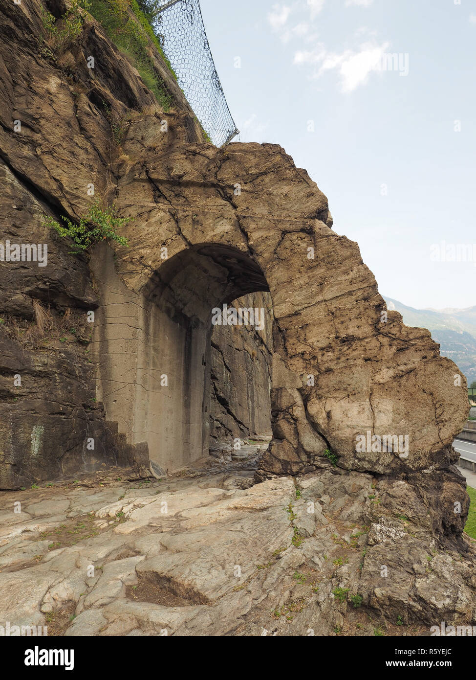 Ancient roman road arch in Donnas Stock Photo - Alamy