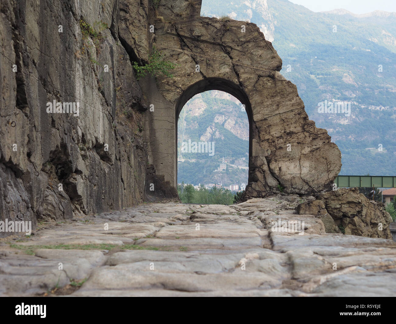 Ancient roman road arch in Donnas Stock Photo - Alamy