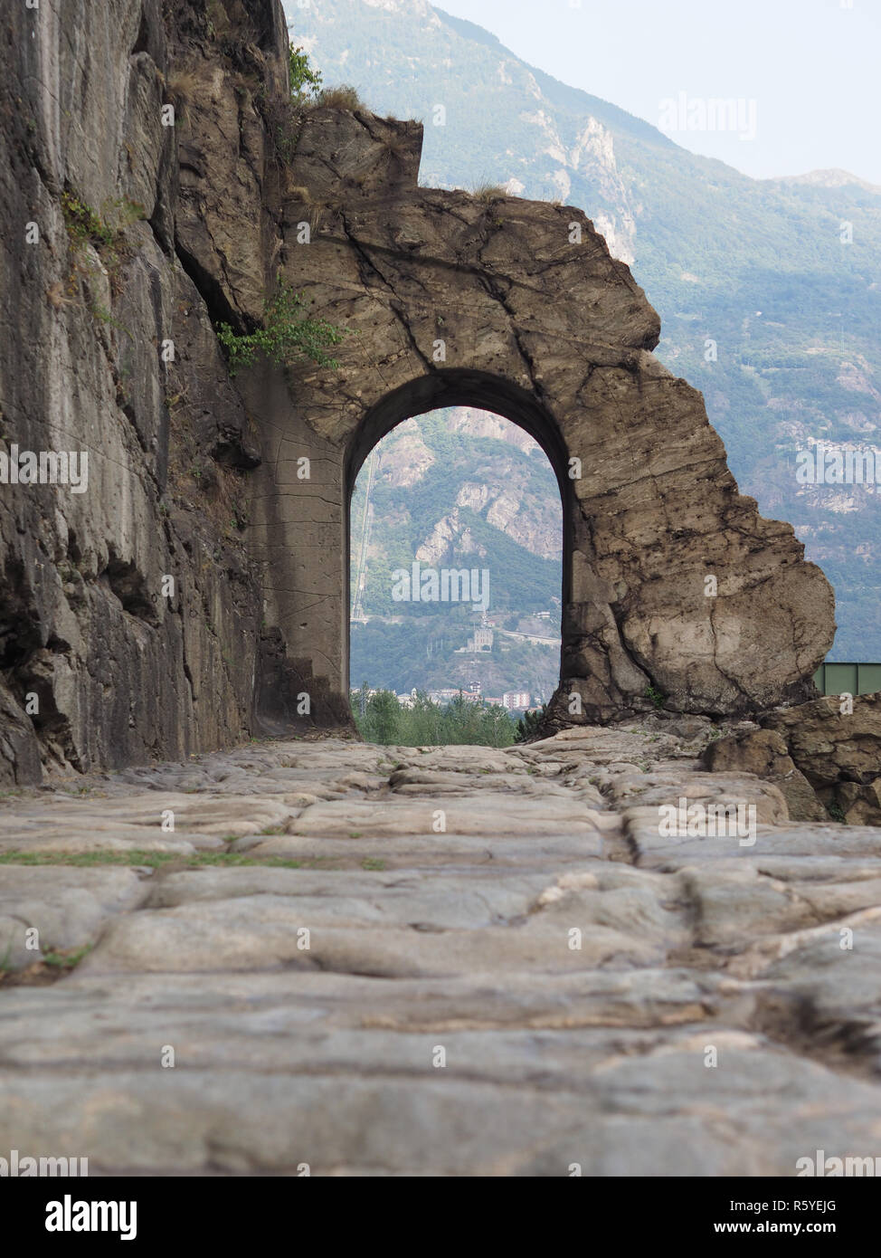 Ancient roman road arch in Donnas Stock Photo - Alamy