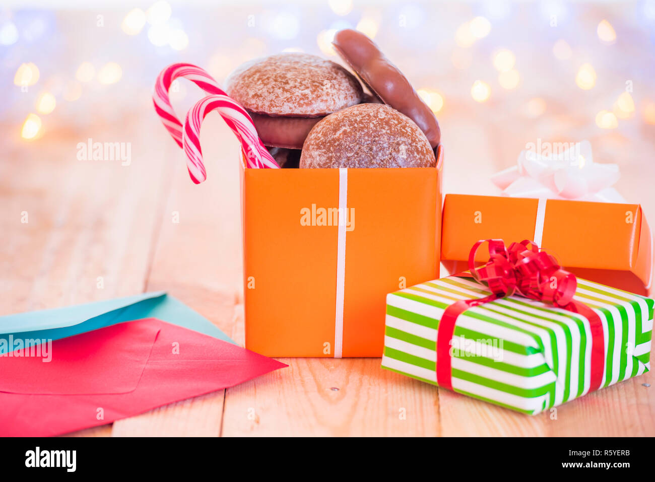 Colorful wrapped presents and letters Stock Photo - Alamy