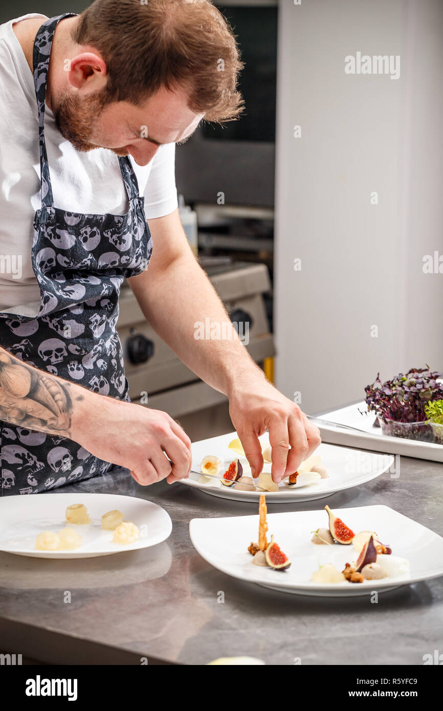 Busy chef at work Stock Photo - Alamy