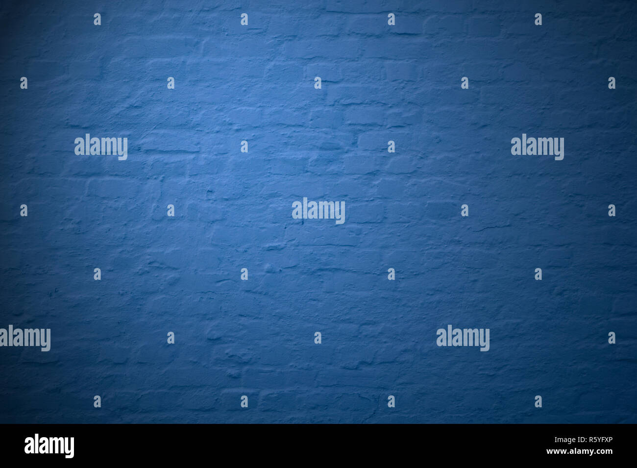 blue stone wall as a background Stock Photo - Alamy