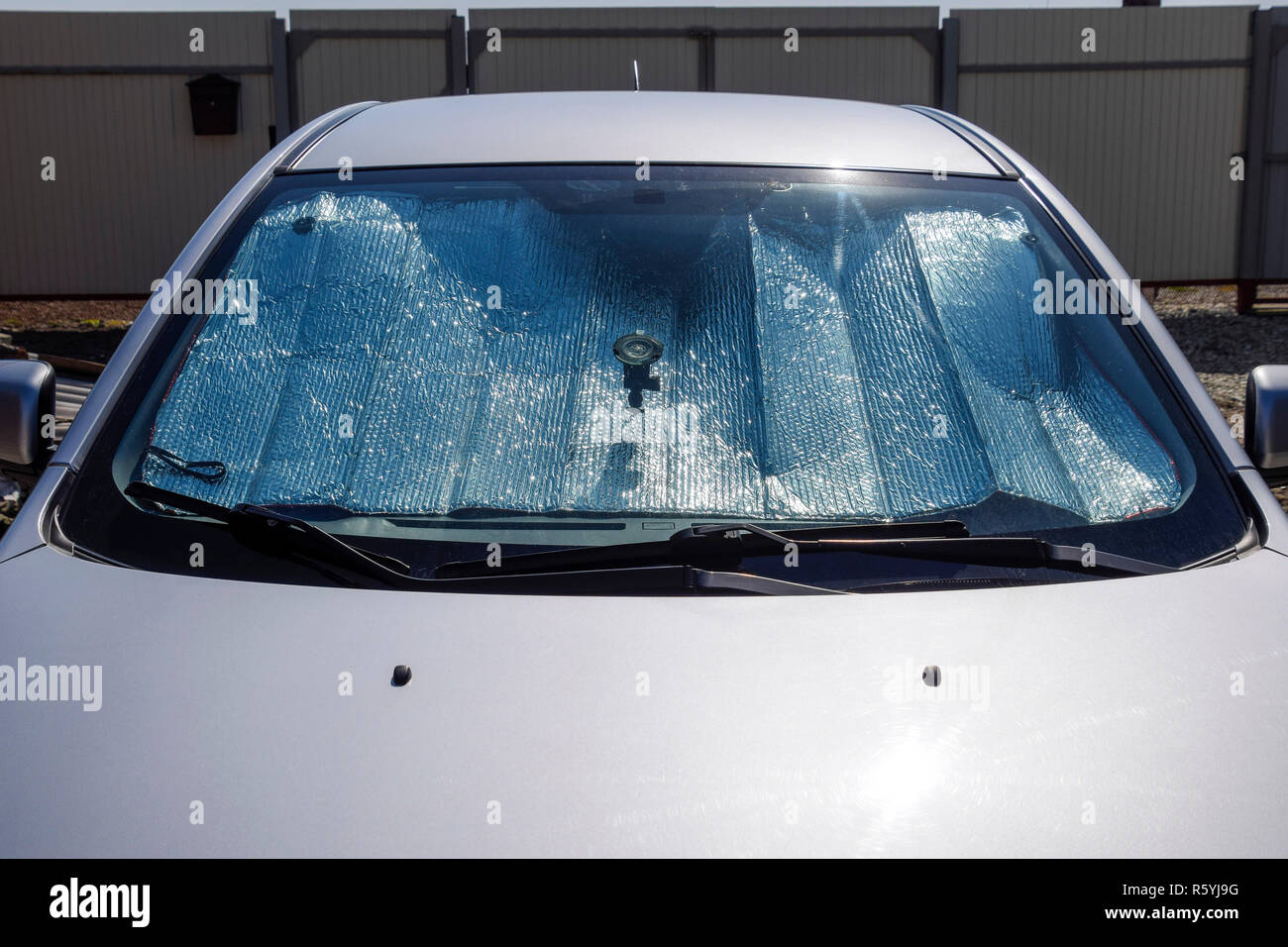 Sun Reflector windscreen. Protection of the car panel from direc Stock ...