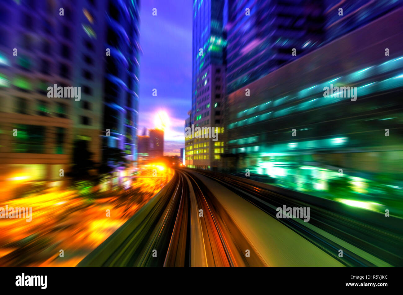 High speed train in city Stock Photo - Alamy